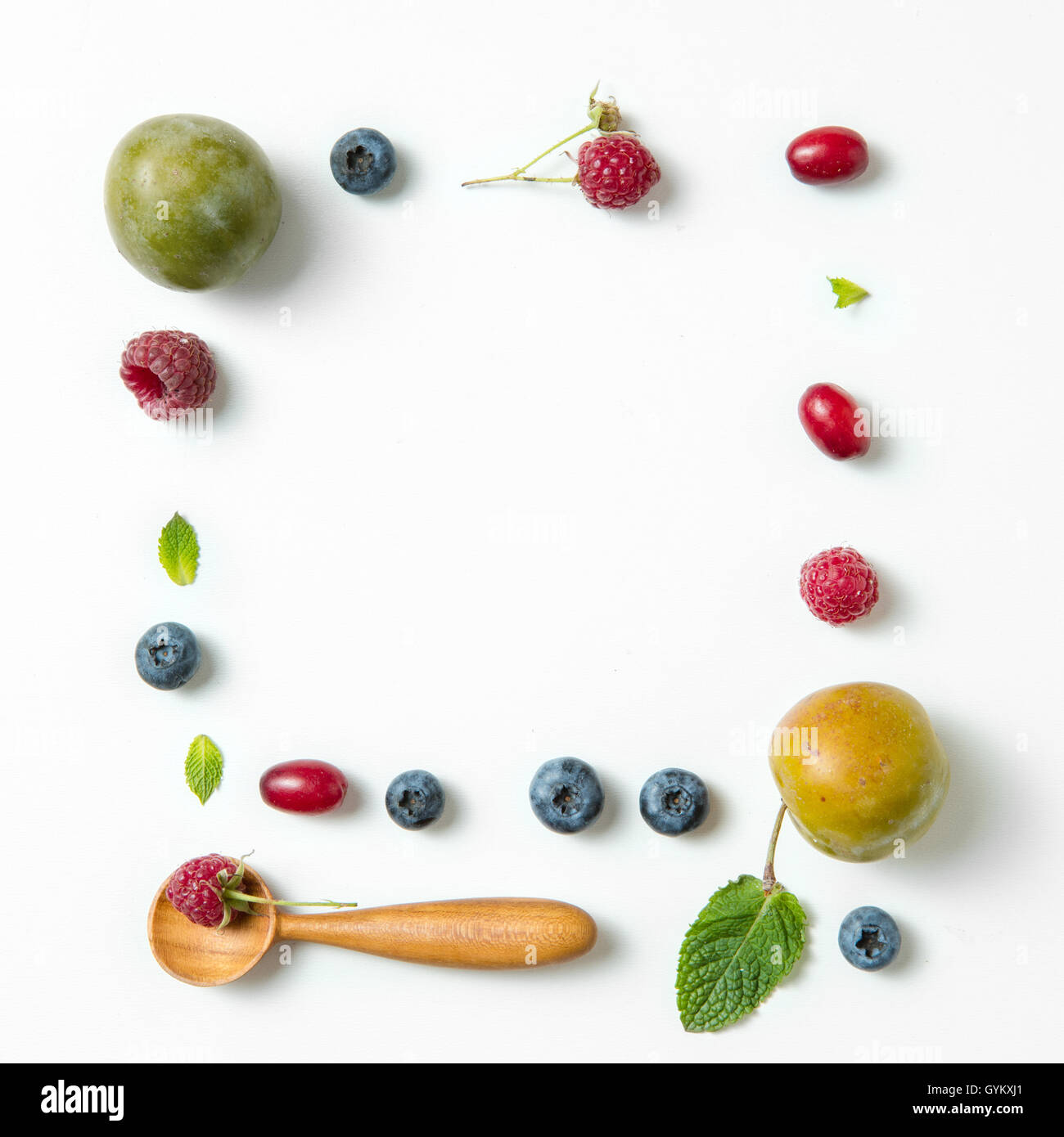 frame with berries on isolated white background Stock Photo - Alamy