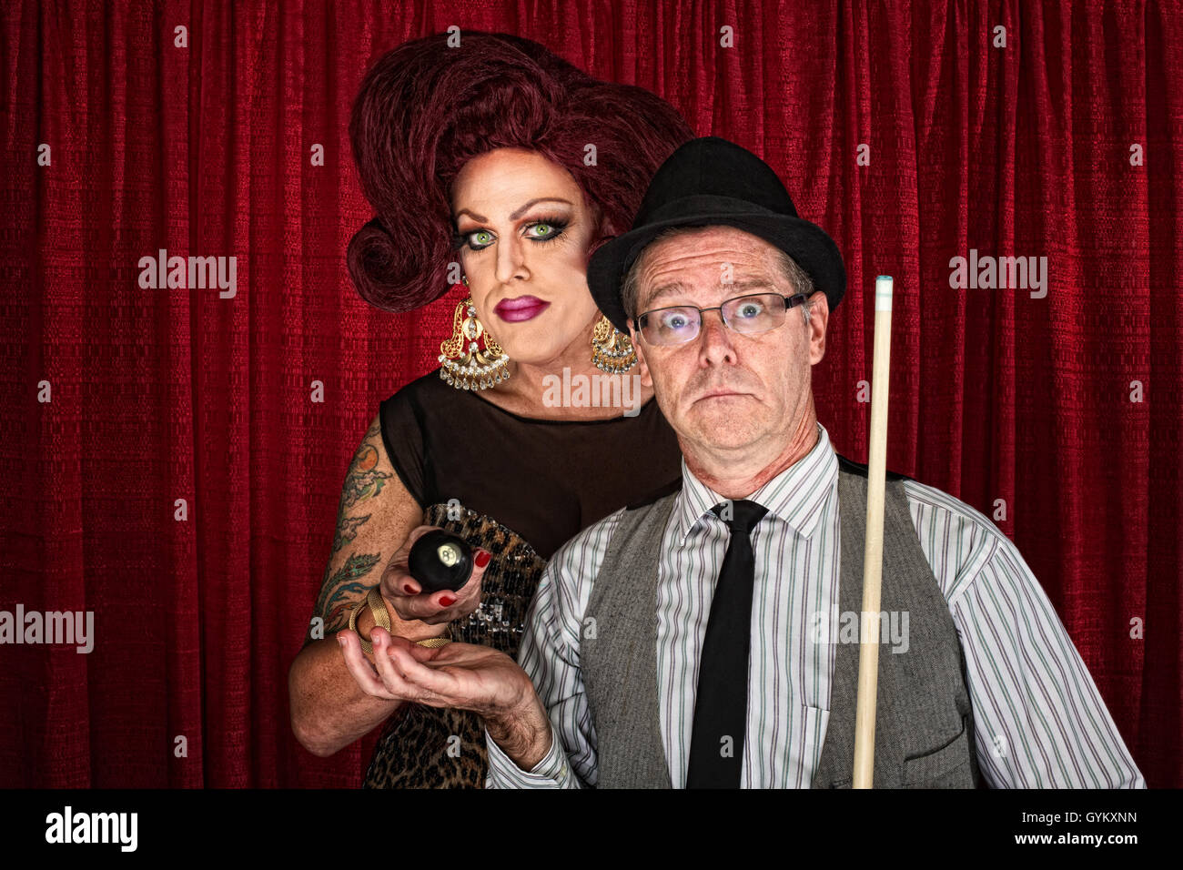 Worried Pool Player with Eight Ball Stock Photo - Alamy