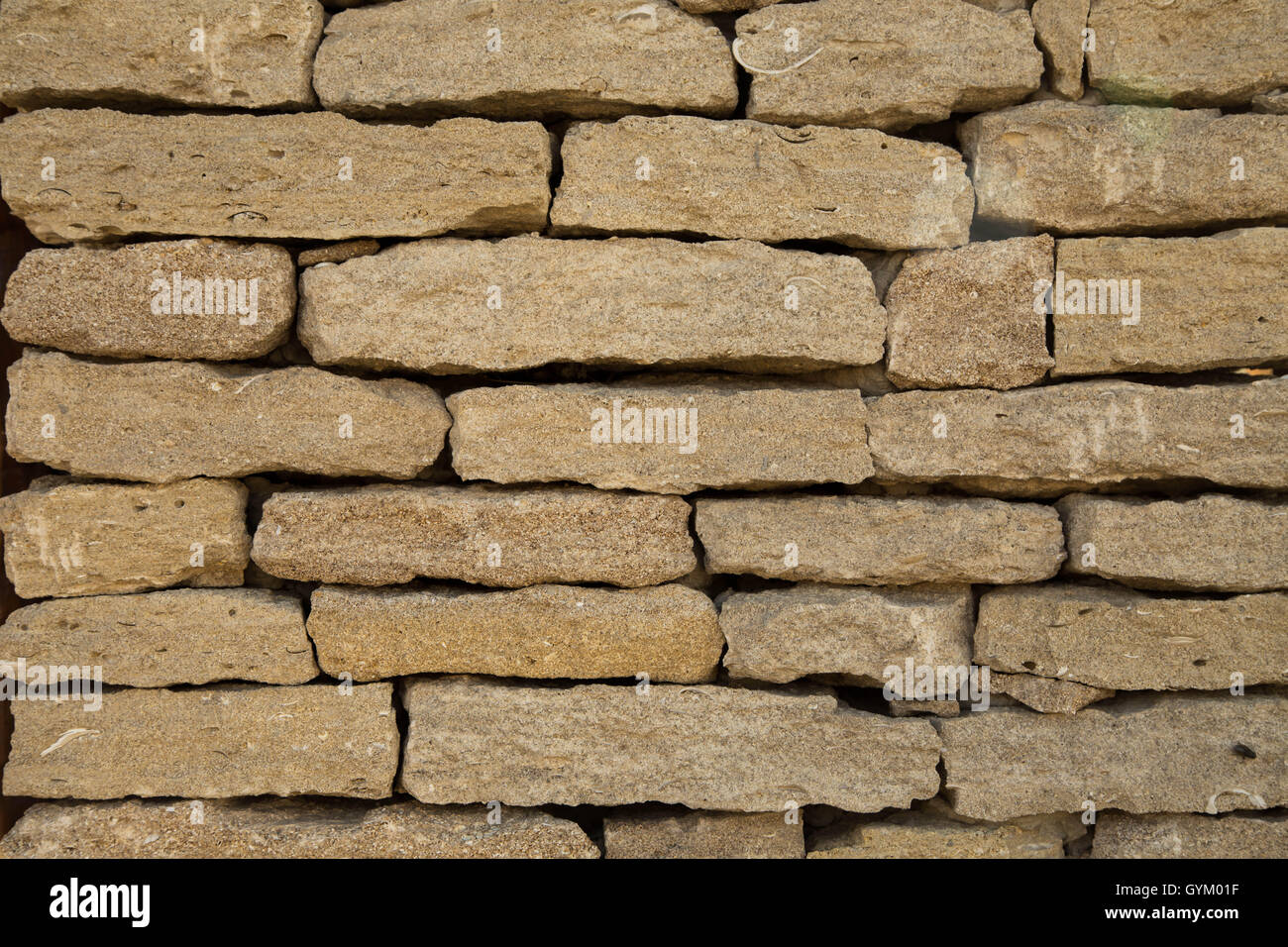 Brown stone wall Stock Photo - Alamy