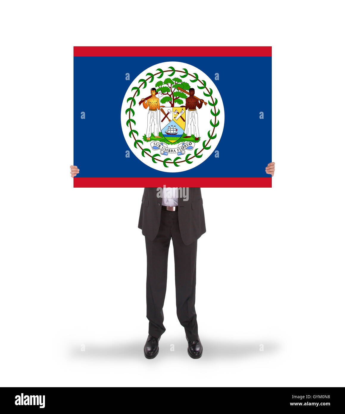 Businessman holding a big card Stock Photo - Alamy