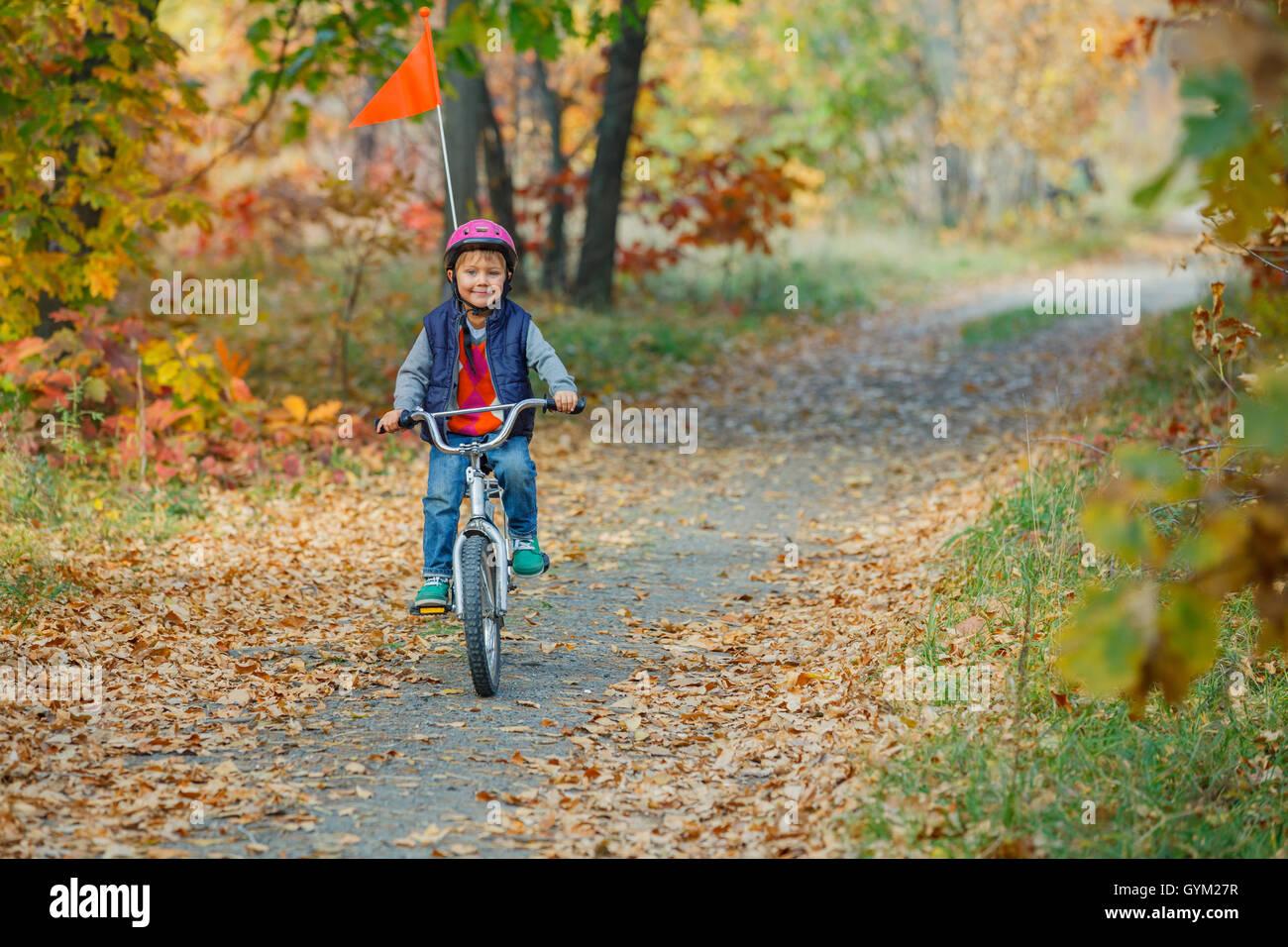 Little boy on bicycle Stock Photo - Alamy