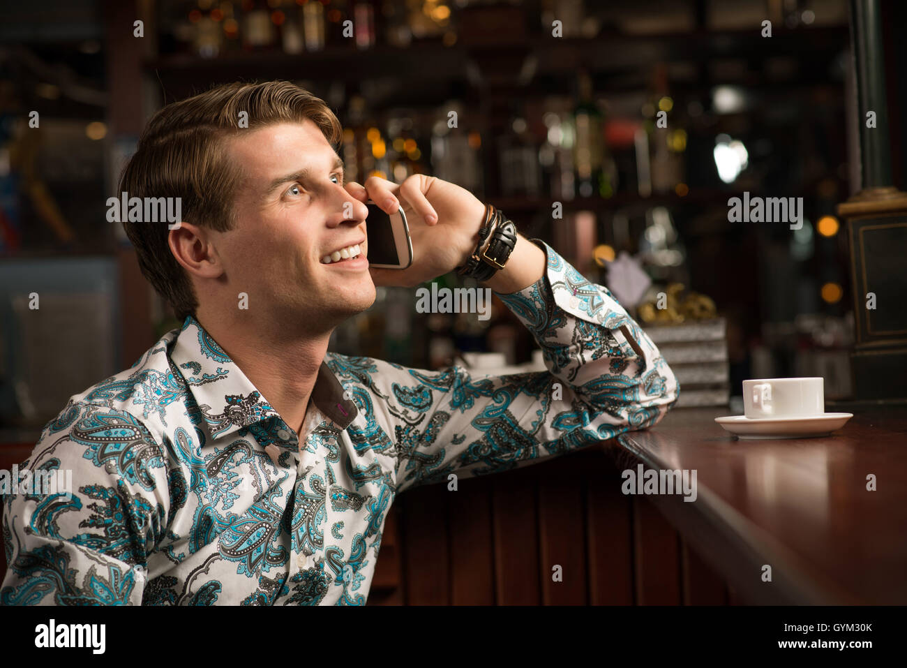 young man at the bar Stock Photo - Alamy