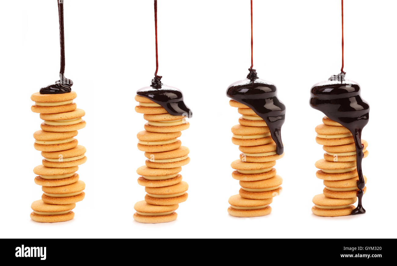 Chocolate dripping on cookies Stock Photo - Alamy
