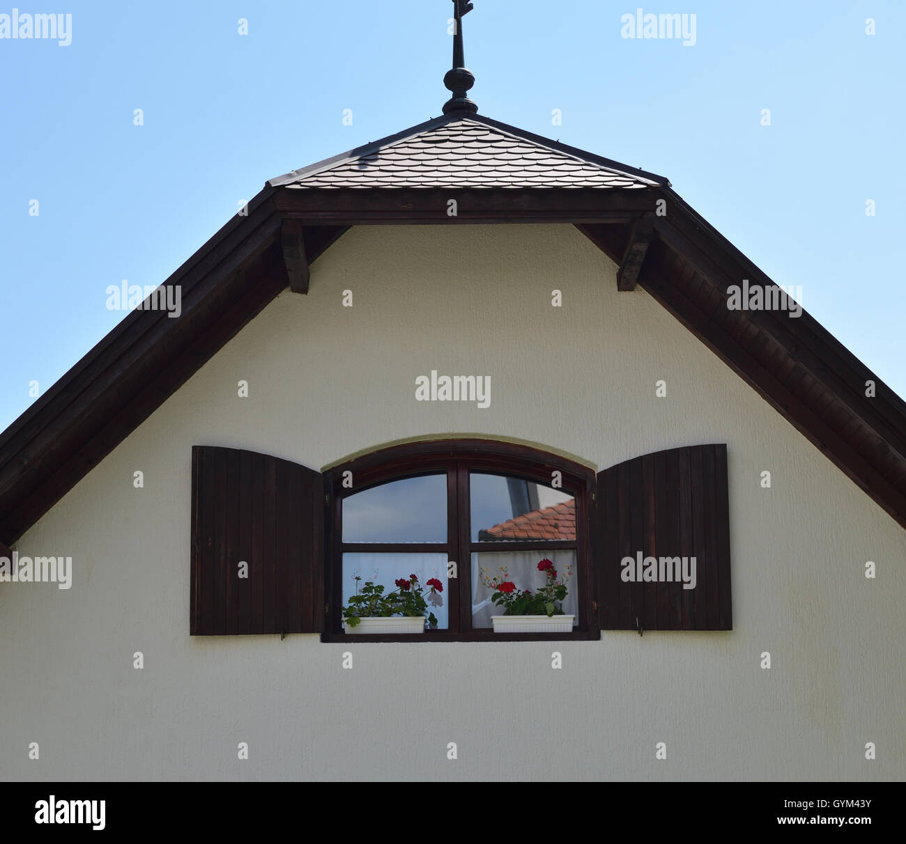 Brown wooden window under a roof of a mountain house Stock Photo - Alamy