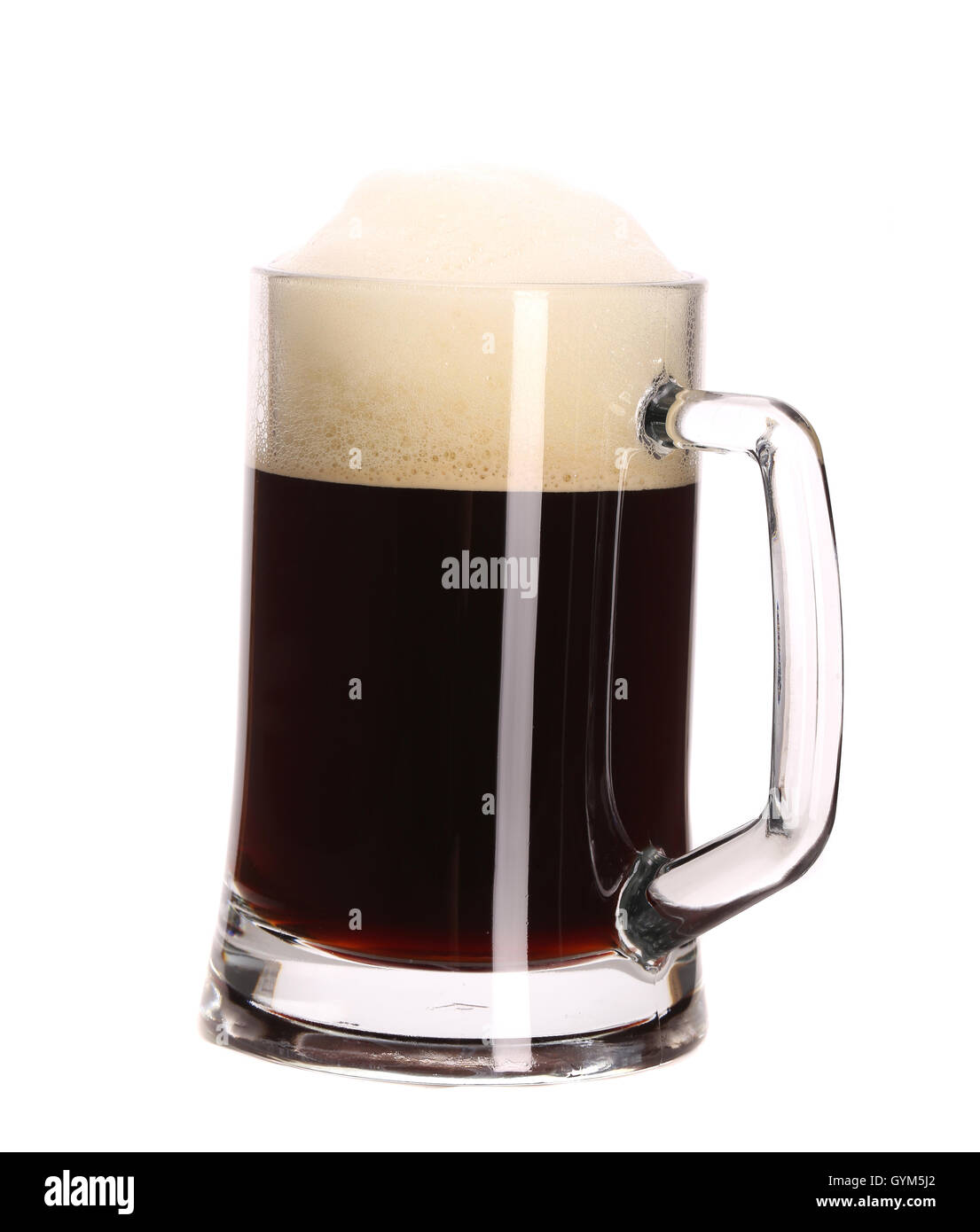 Tall big mug of brown beer with foam Stock Photo - Alamy