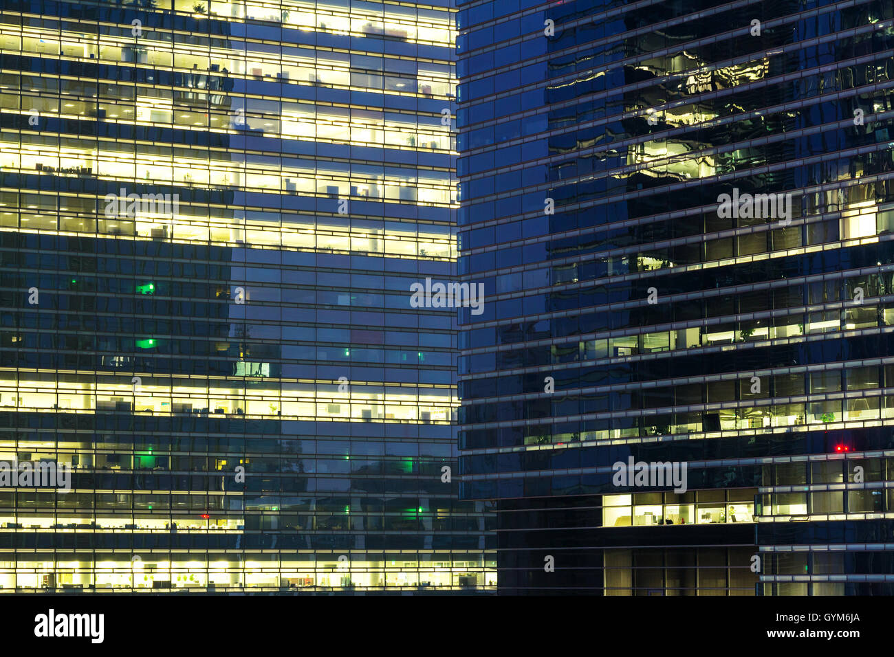Modern office building at night Stock Photo - Alamy
