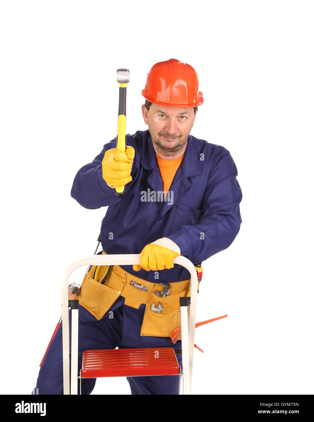 Worker on ladder with hammer Stock Photo - Alamy