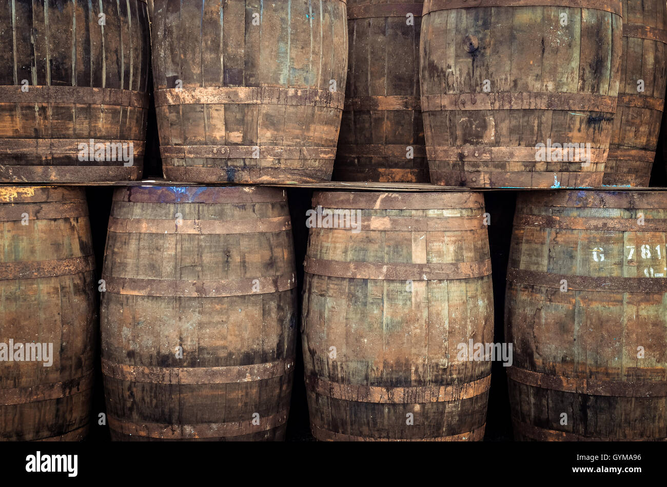 Stacked old whisky barrels Stock Photo - Alamy
