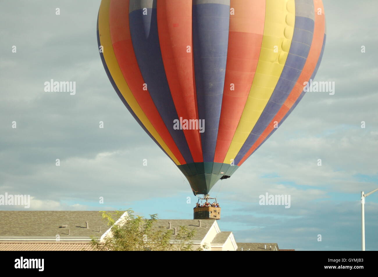 Hot air balloon sitting on roof top hi-res stock photography and images ...