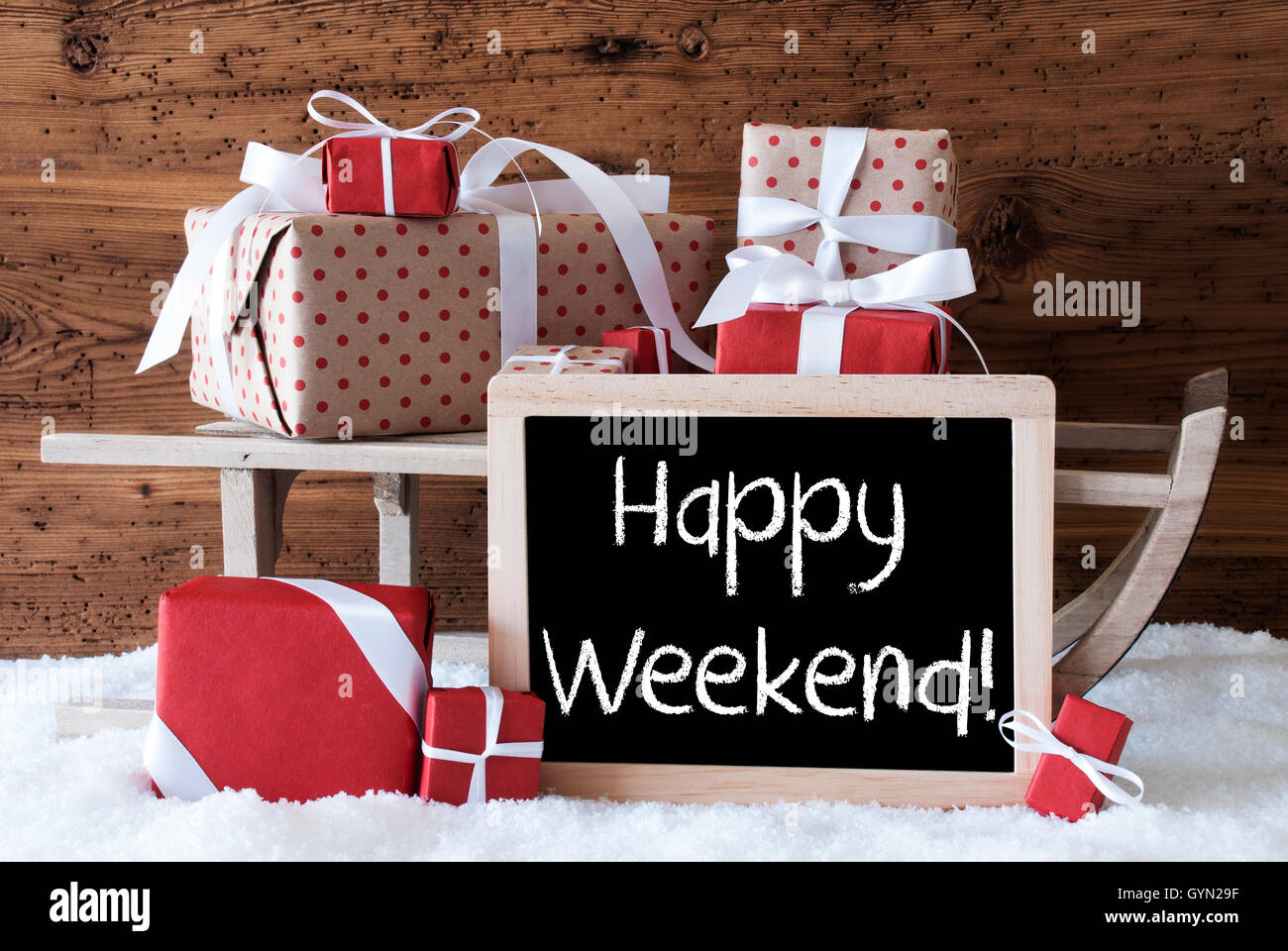 Sleigh With Gifts On Snow, Text Happy Weekend Stock Photo - Alamy