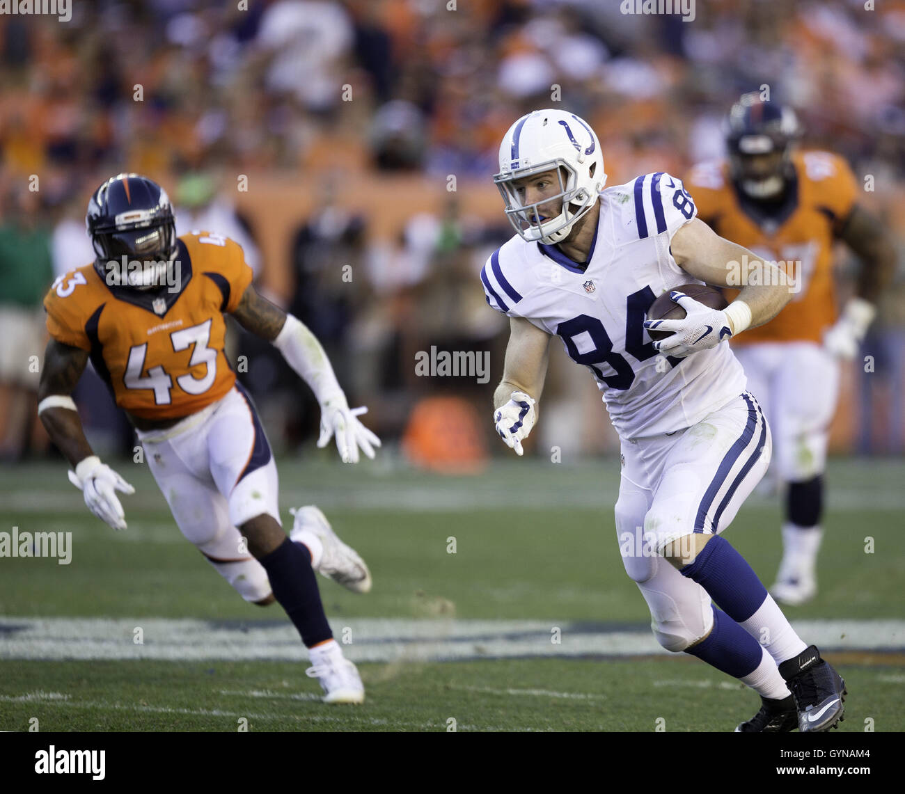 Denver, Colorado, USA. 18th Sep, 2016. Colts TE JACK DOYLE, right, runs ...