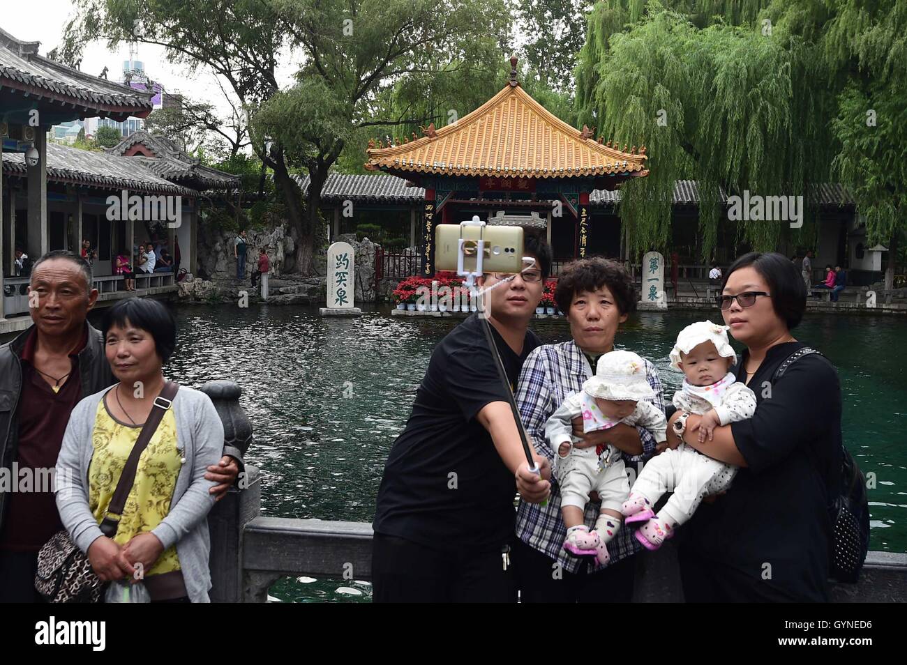Jinan, China's Shandong Province. 19th Sep, 2016. Tourists pose for ...