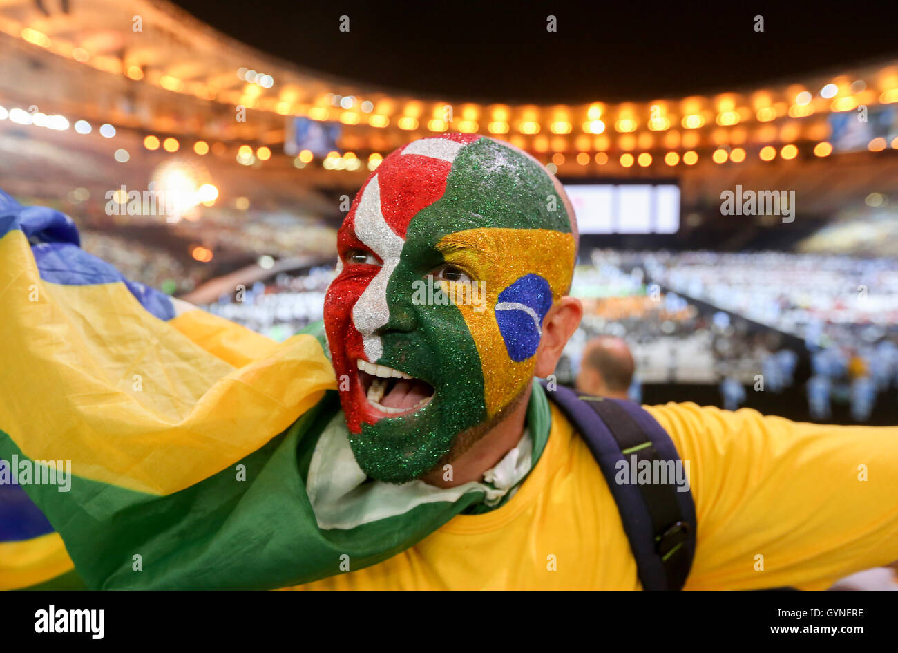 A spectator cheers for the athletes during the Closing Ceremony of the ...