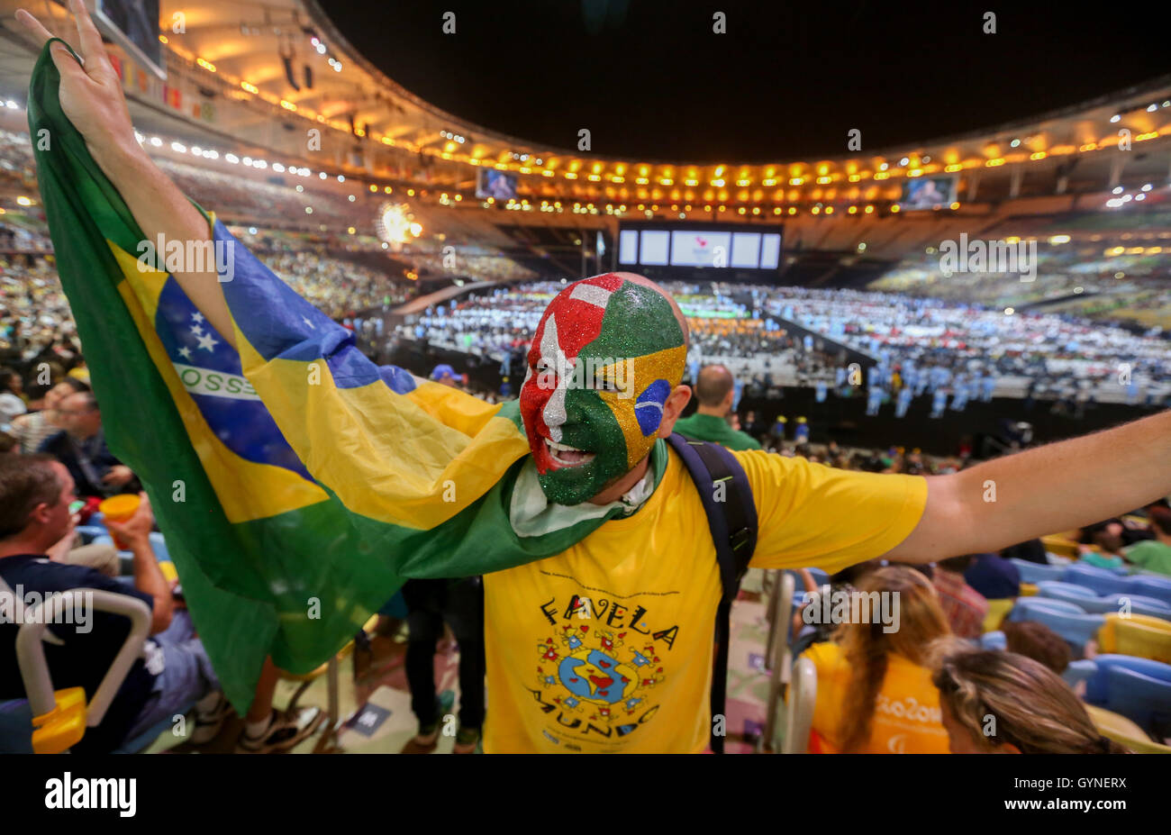 A spectator cheers for the athletes during the Closing Ceremony of the ...