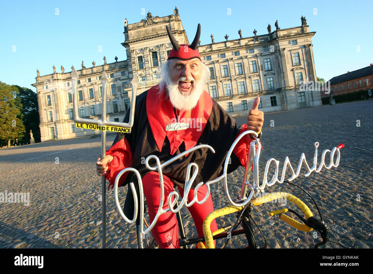 The bike designer Dieter "Didi" Senft posing in front of the Baroque ...