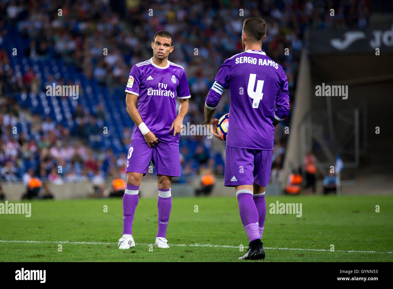 BARCELONA - SEP 18: Pepe (l) and Sergio Ramos (r) play at the La Liga ...