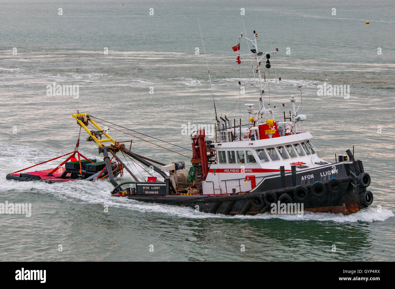 Tug towing navy boat hi-res stock photography and images - Alamy
