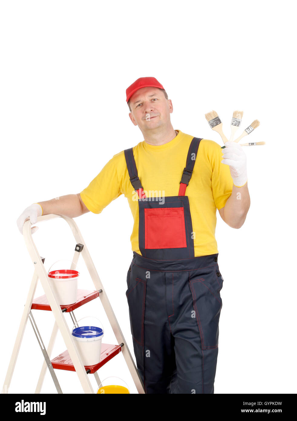 Worker standing on ladder Stock Photo - Alamy