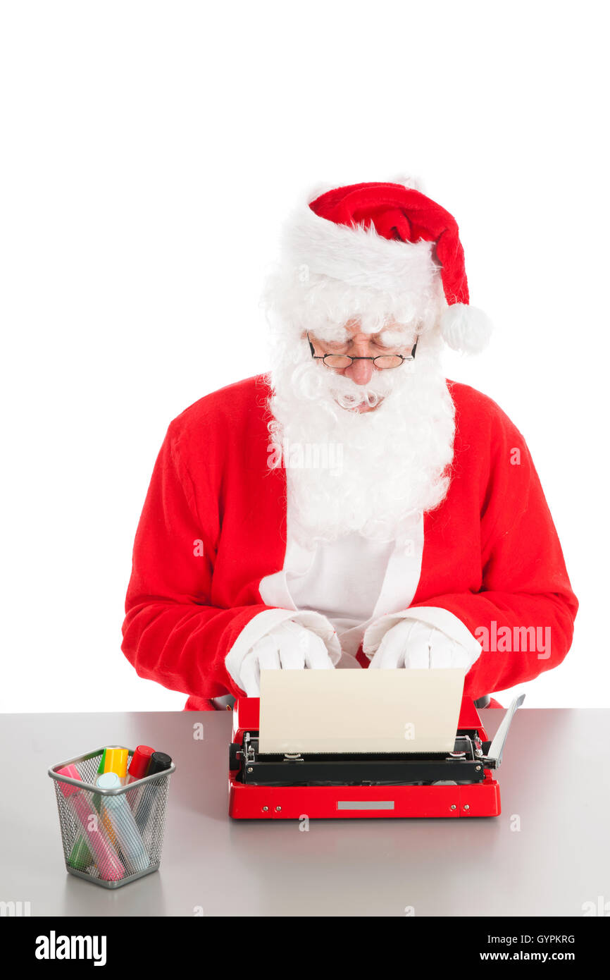 Santa Claus writing a letter Stock Photo - Alamy