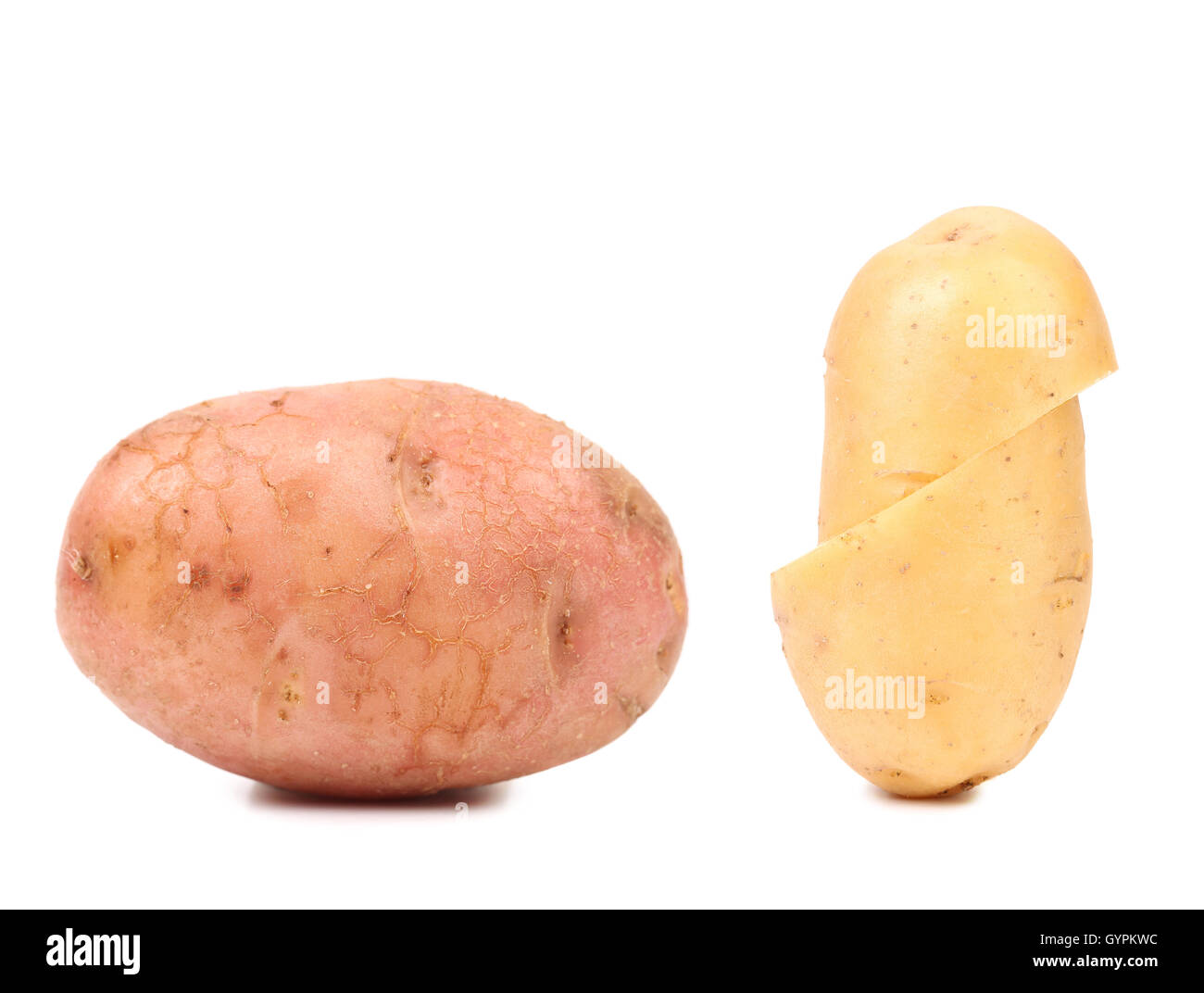 Two potatoe whole and cut Stock Photo - Alamy
