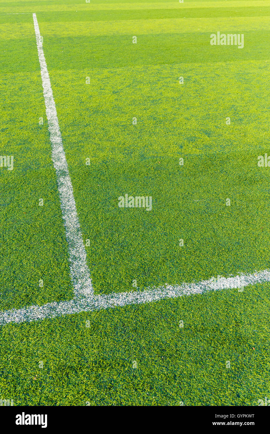 White line on the green turf for football court Stock Photo - Alamy