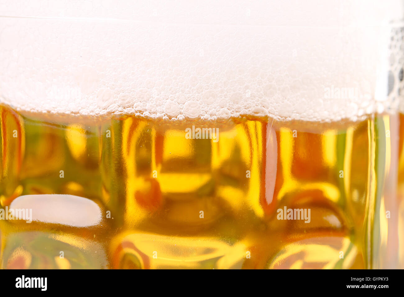 Closeup of mug with beer foam Stock Photo - Alamy