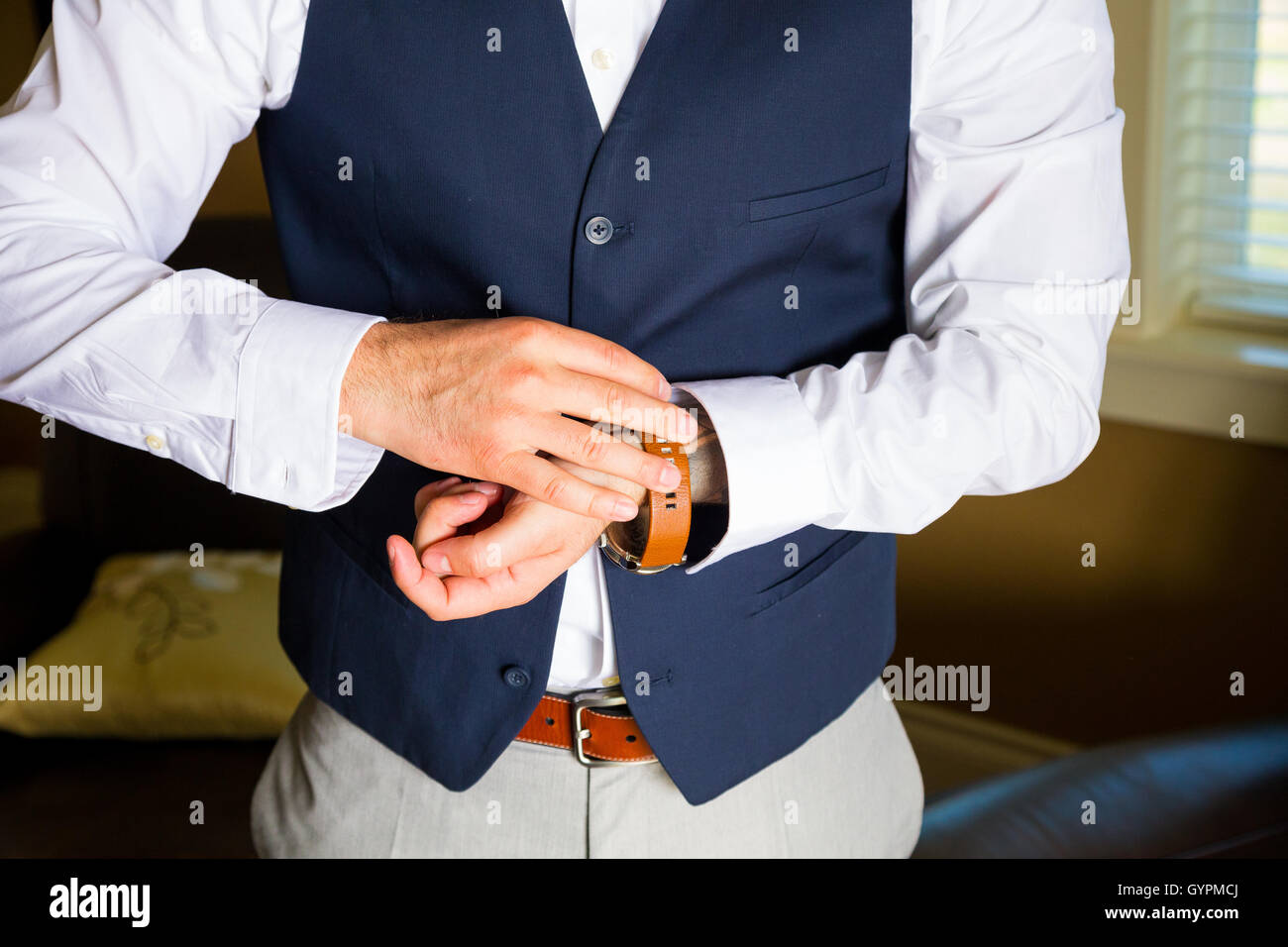 Groom Getting Ready Stock Photo - Alamy