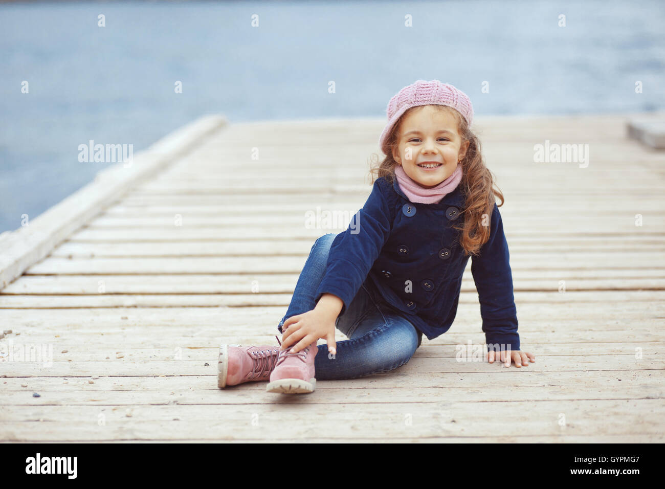 Child walking in the city Stock Photo - Alamy