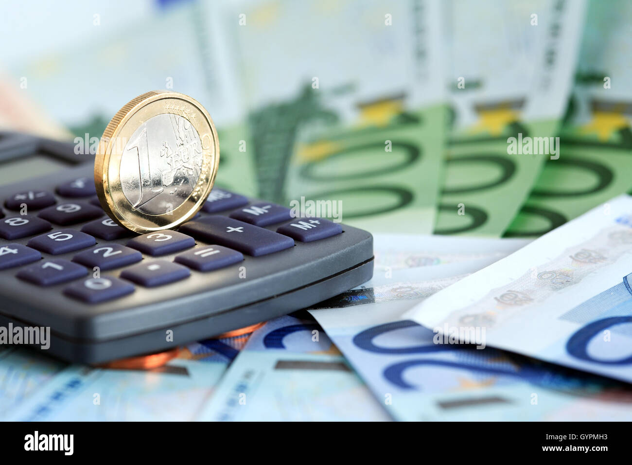 Calculator And Money Stock Photo - Alamy