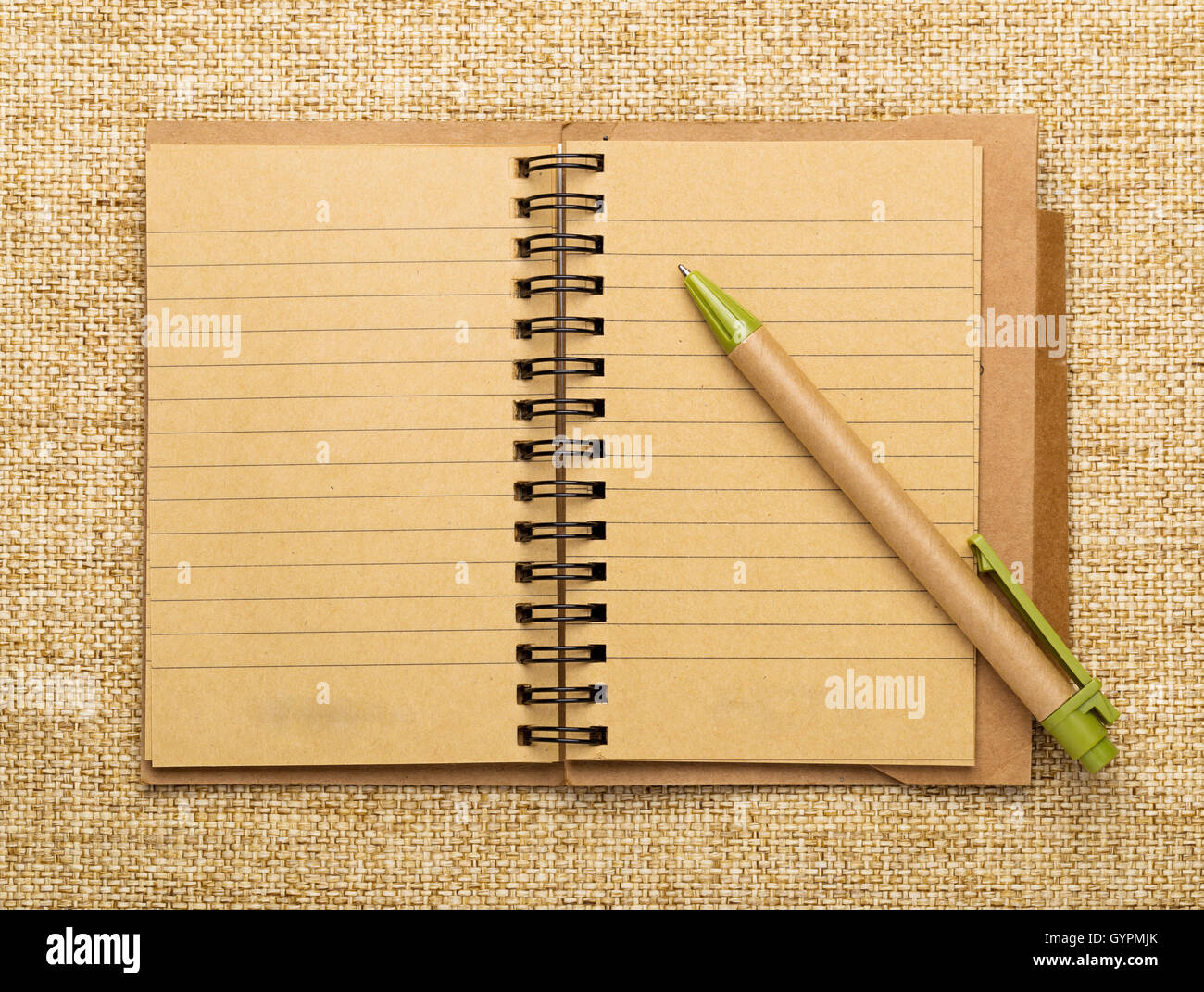 Spiral notebook and pen Stock Photo - Alamy