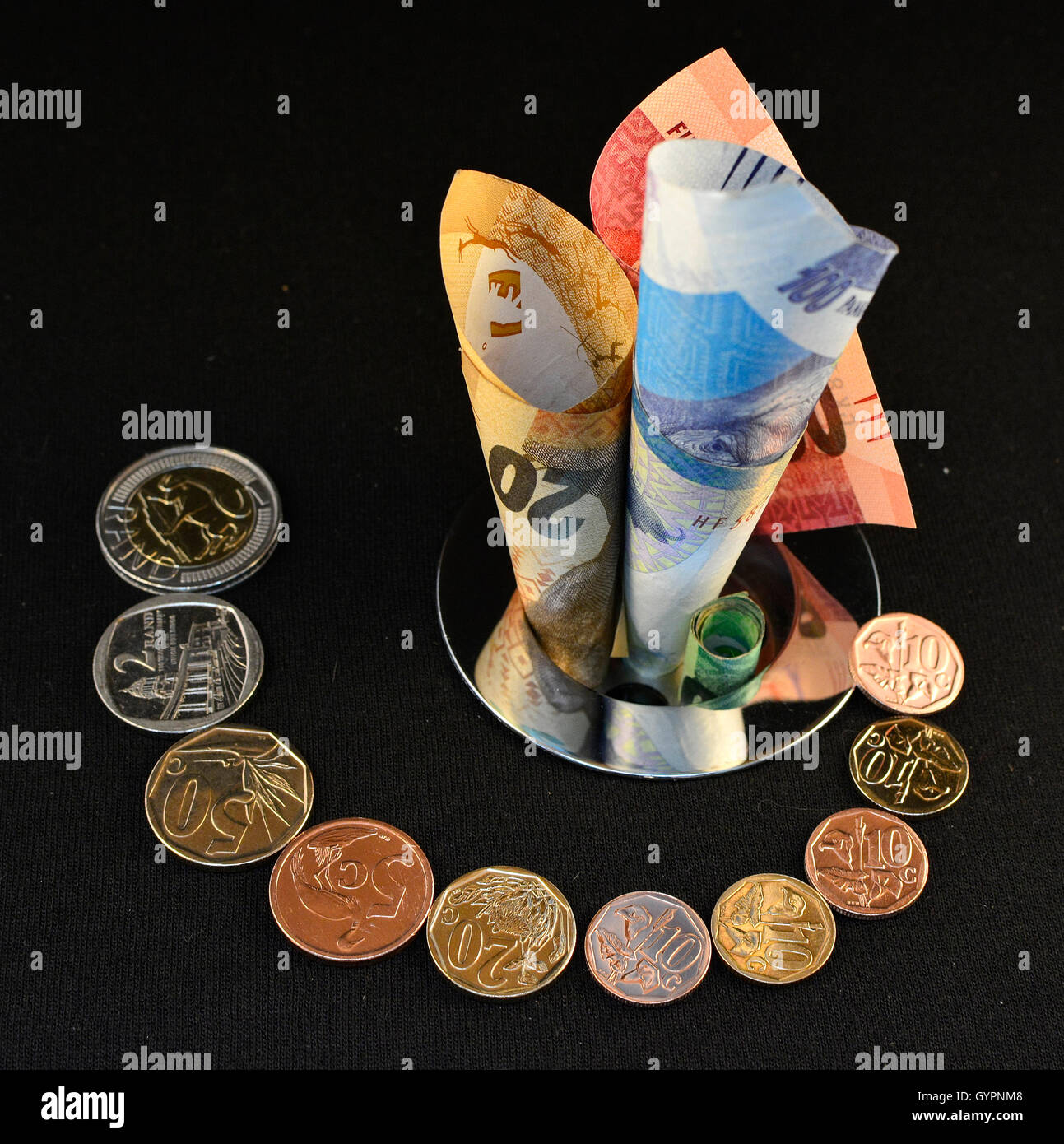 Money down the drain concept. Money lost. Money spent unwisely ...