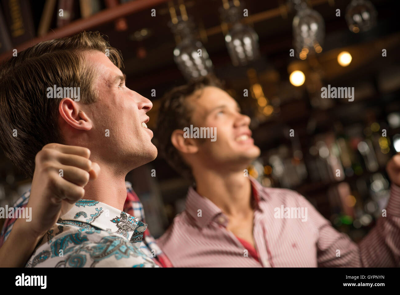 portrait of the fans in the bar Stock Photo - Alamy