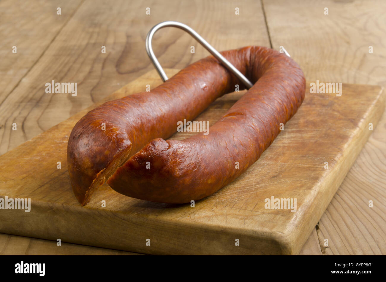 hungarian kolbasz on a butchers hook Stock Photo - Alamy