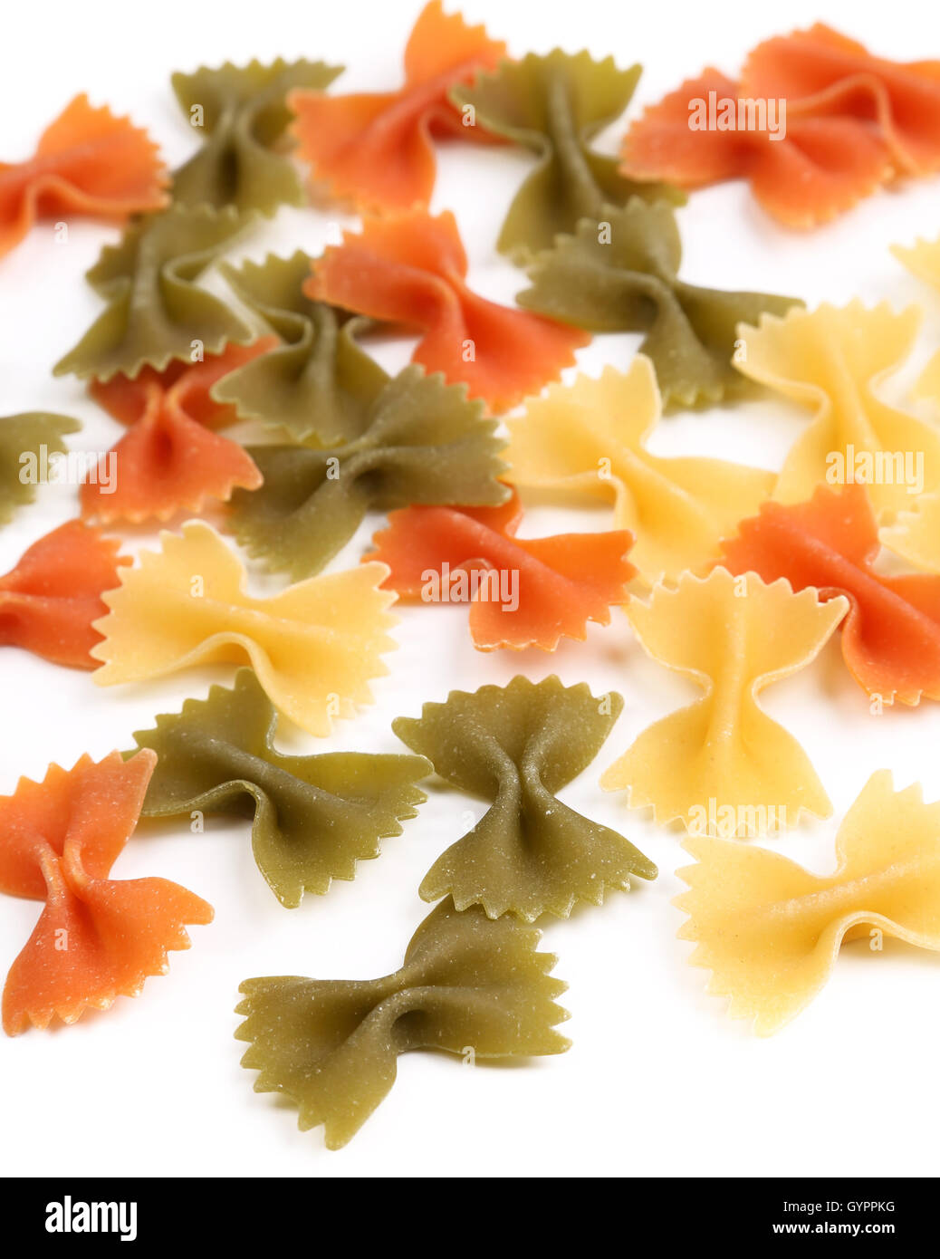 Farfalle pasta three colors Stock Photo - Alamy