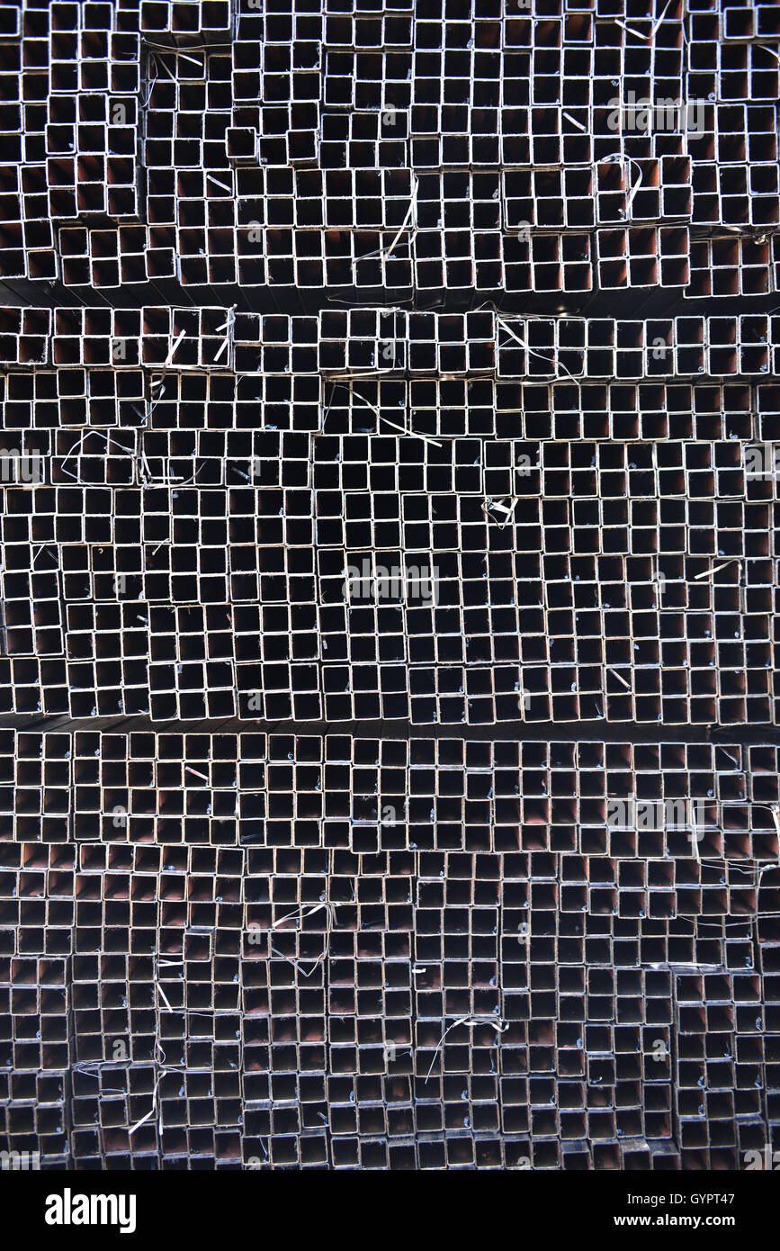 Stacked square metal Stock Photo - Alamy