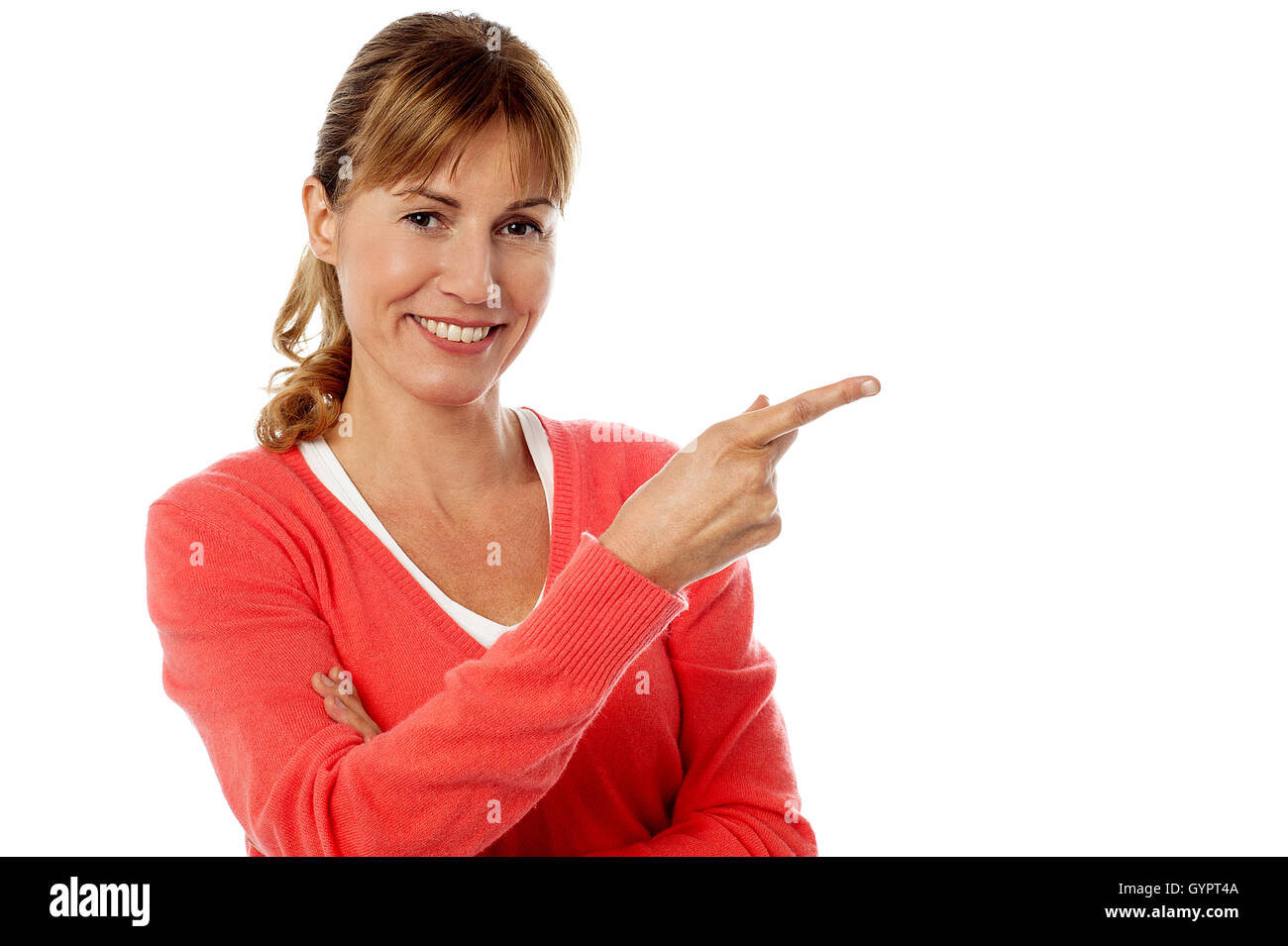 Stylish woman pointing at something Stock Photo - Alamy