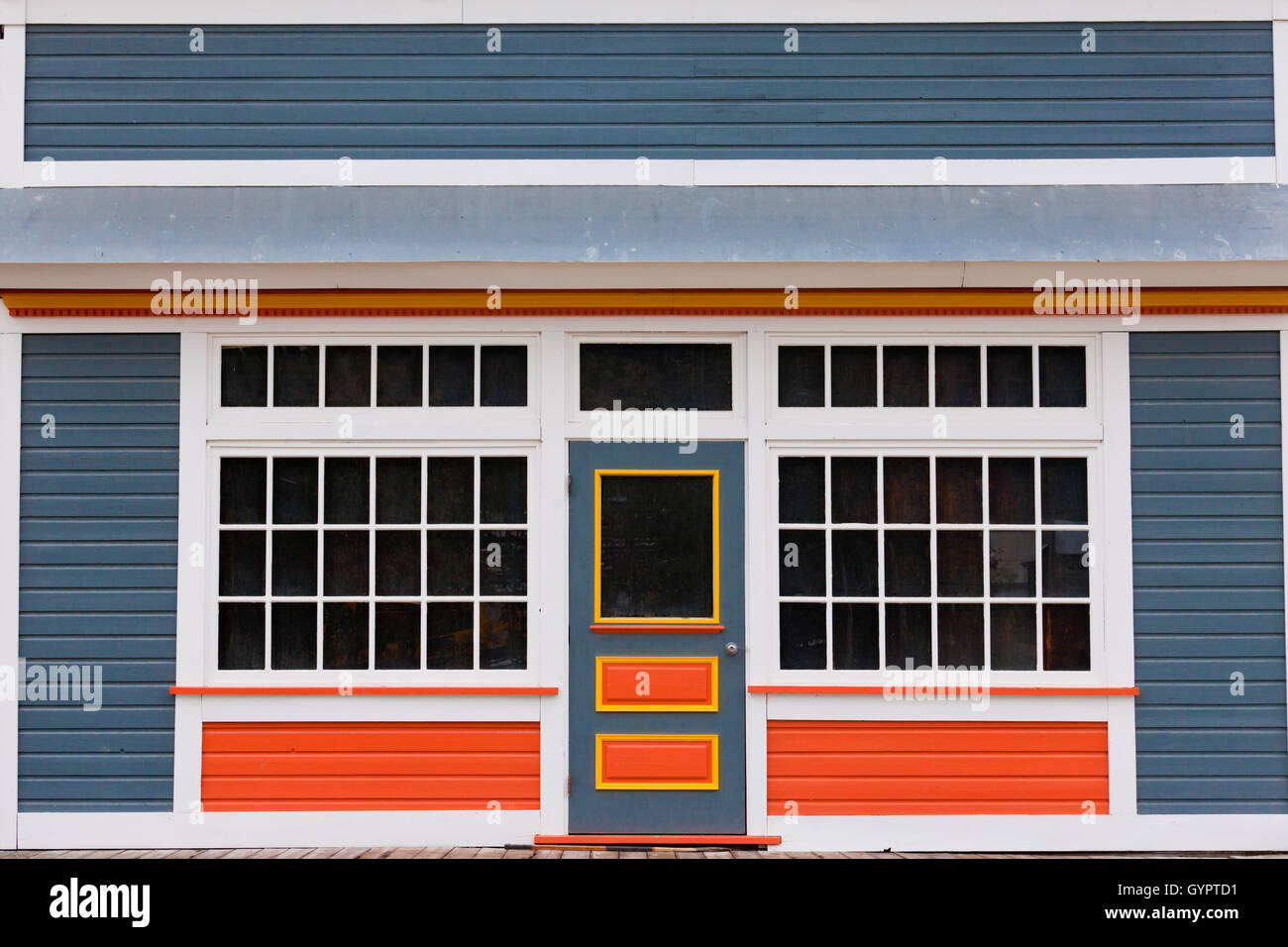 Small store front entrance colorful wooden house Stock Photo - Alamy