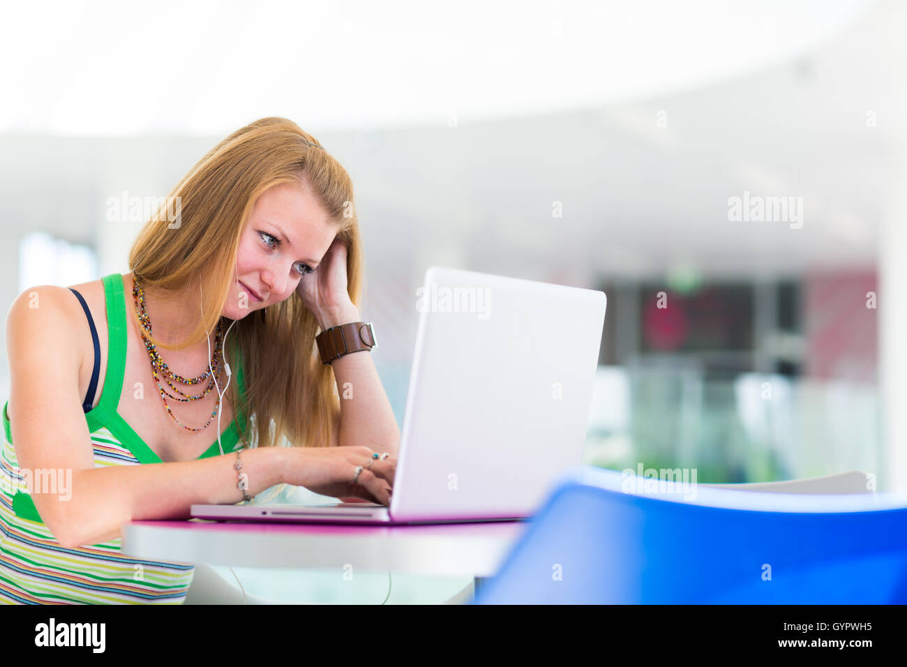 pretty female college student working on her laptop computer Stock ...