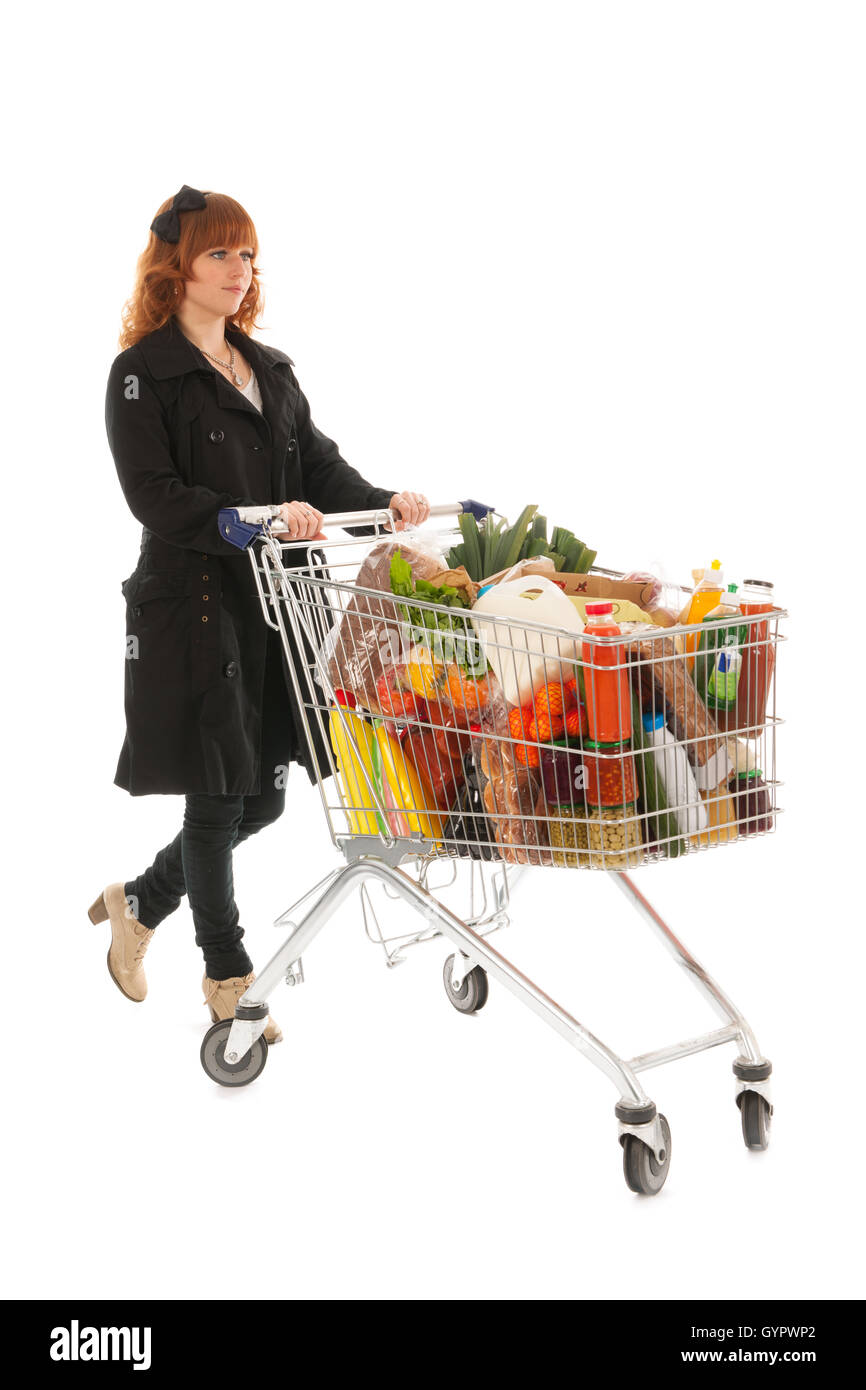 Young woman shopping supermarket Cut Out Stock Images & Pictures - Alamy