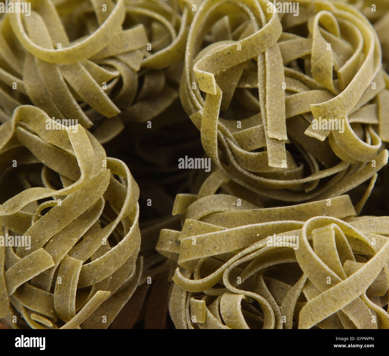 Italian green pasta tagliatelle Stock Photo - Alamy