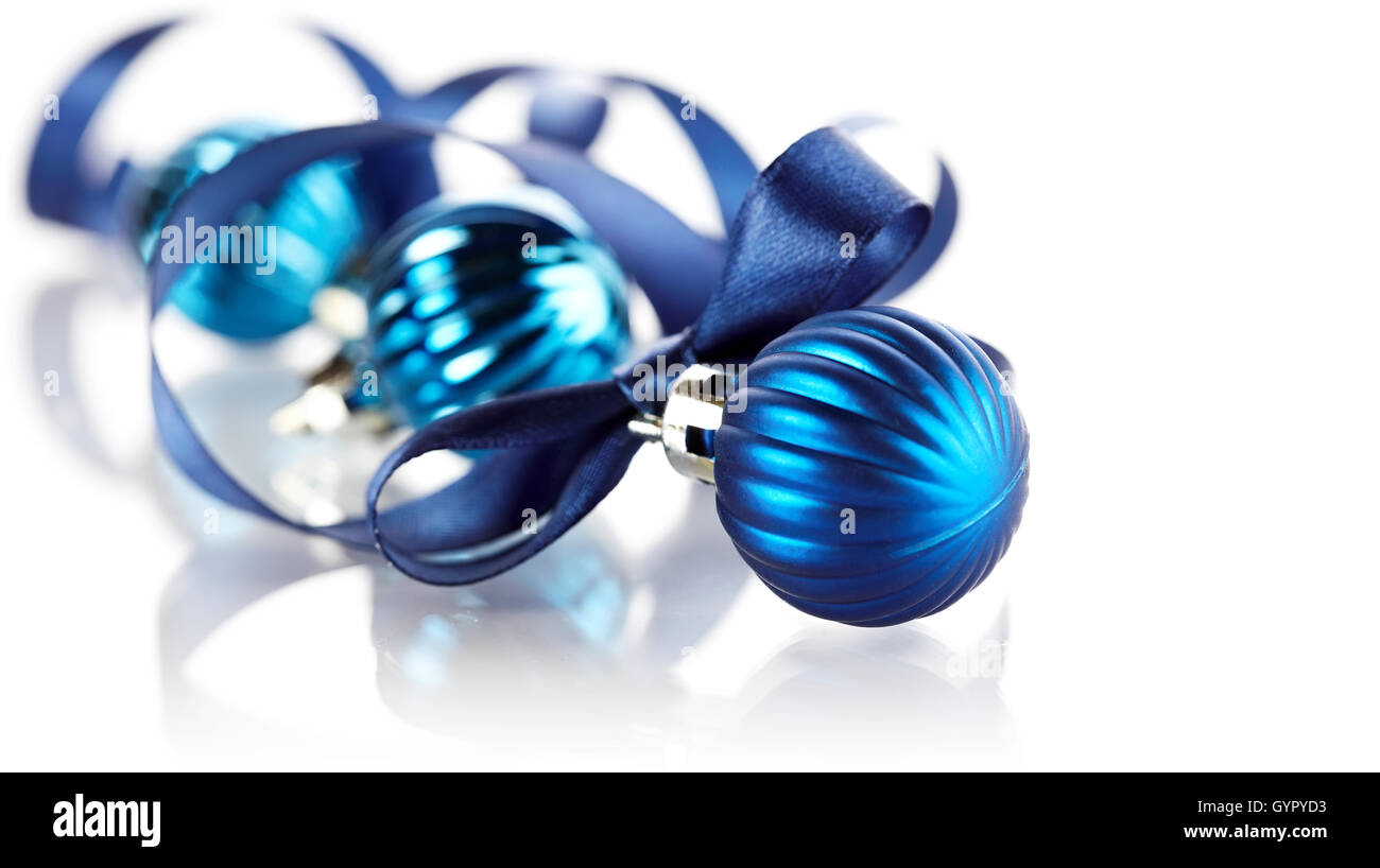 New Year's blue balls with a blue satin ribbon Stock Photo - Alamy
