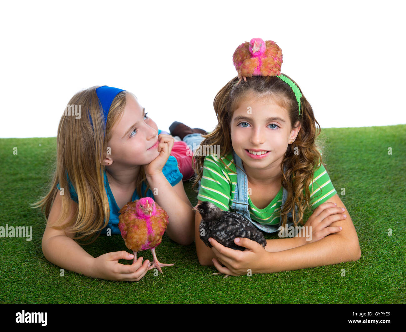 breeder hens kid sister farmer girls having fun with chicken chi Stock ...