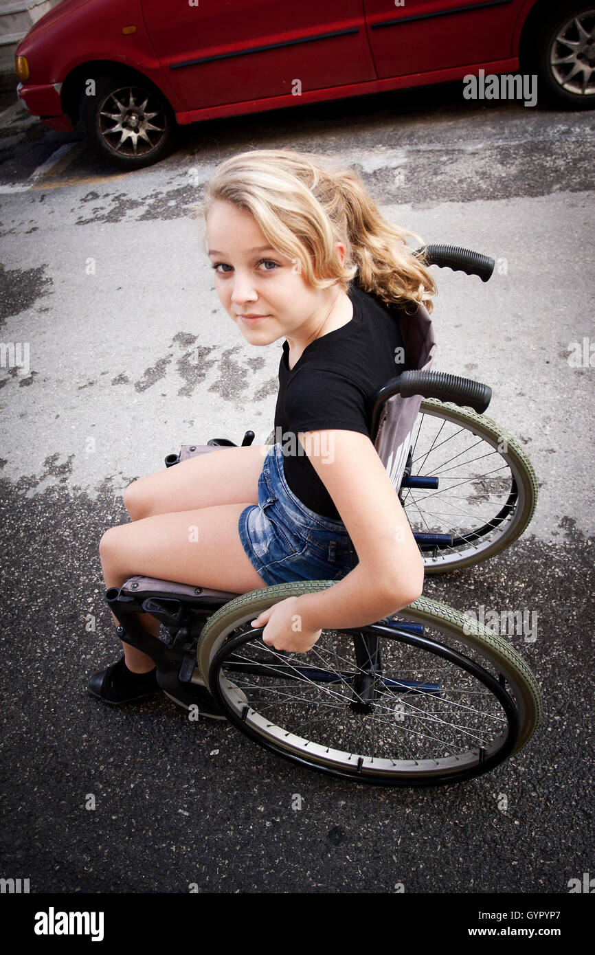 Child in wheelchair Stock Photo - Alamy