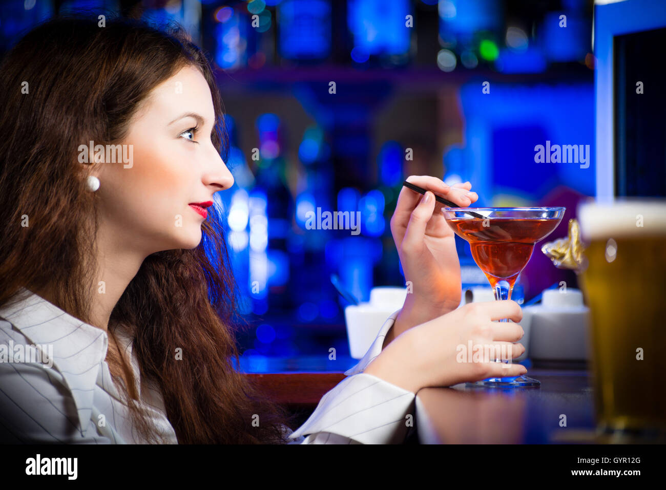 young woman in a bar Stock Photo - Alamy