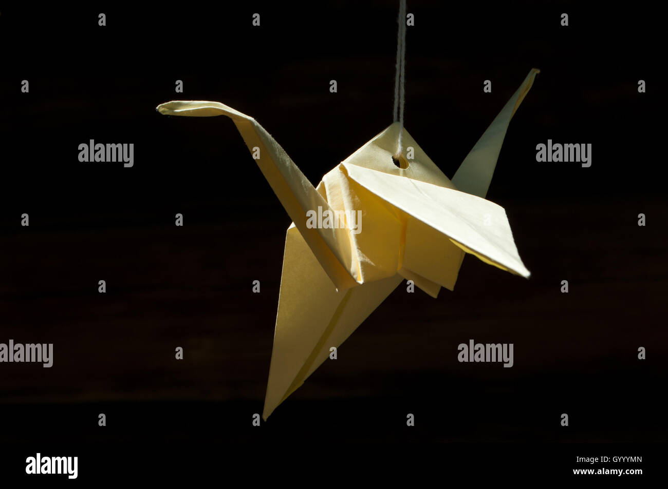 Origami paper dragon in the dark Stock Photo - Alamy