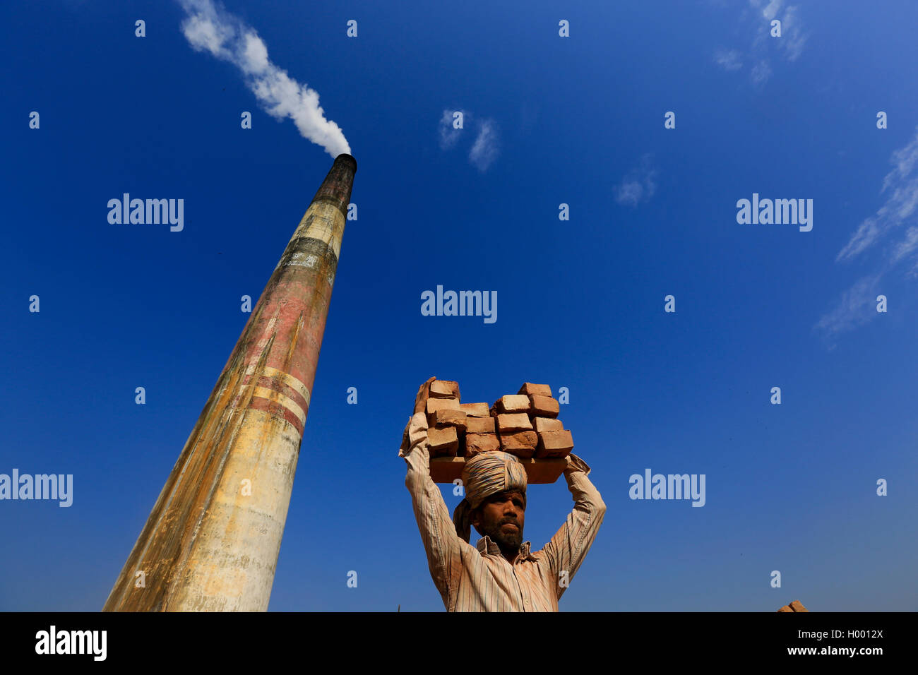 A labourer works at brickfield at Amin Bazar. Dhaka, Bangladesh Stock ...