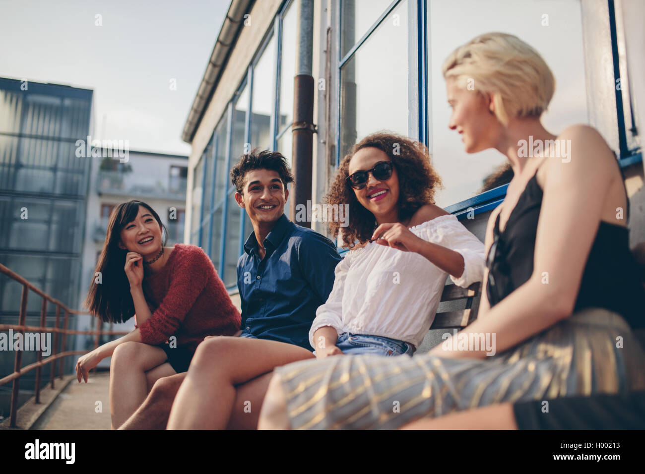 Group people african friends talking hi-res stock photography and ...