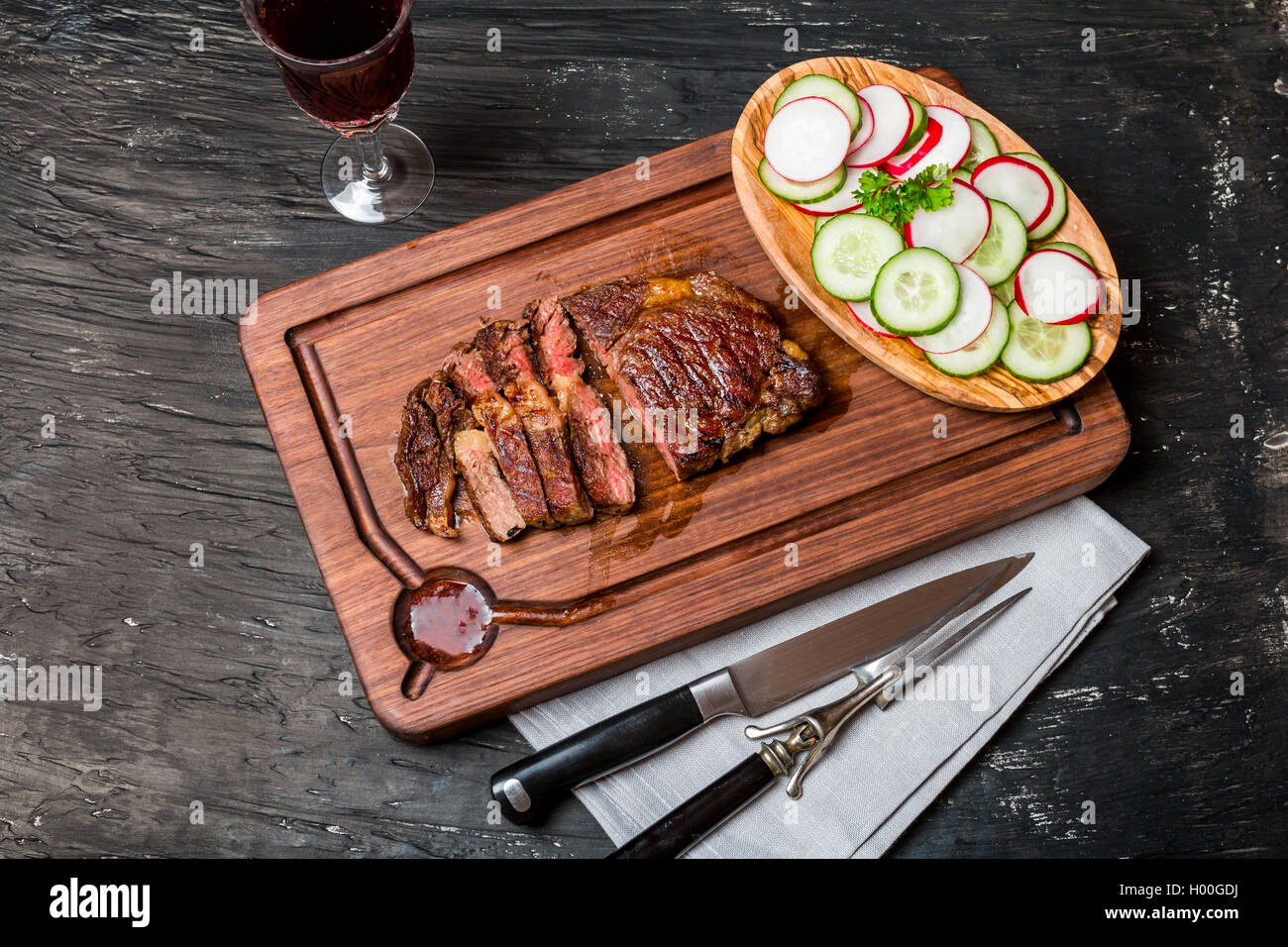 sliced medium rare grilled Beef steak Ribeye Stock Photo - Alamy