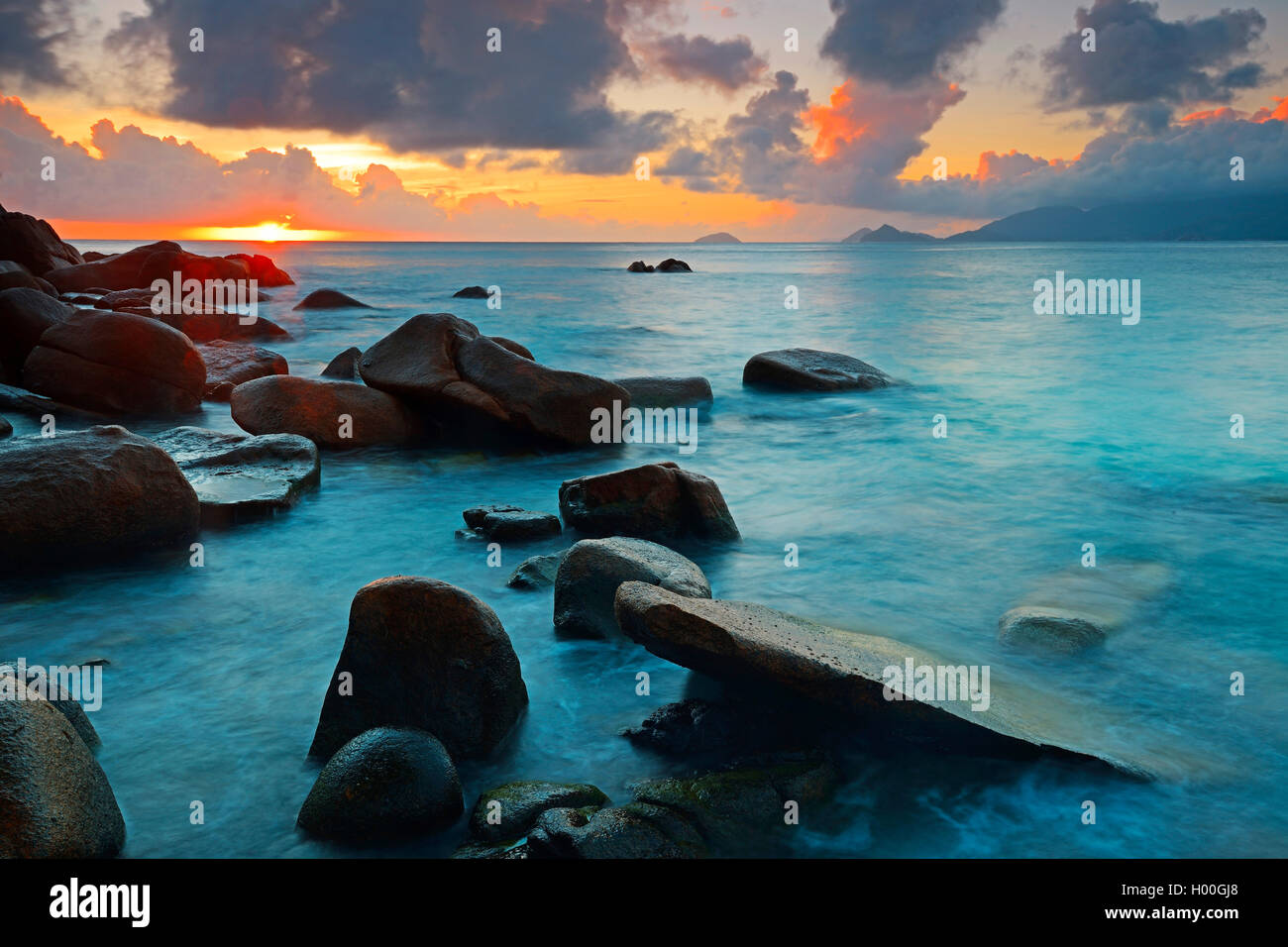 gorgeous sunset at Anse Soleil, Seychelles, Mahe Stock Photo - Alamy