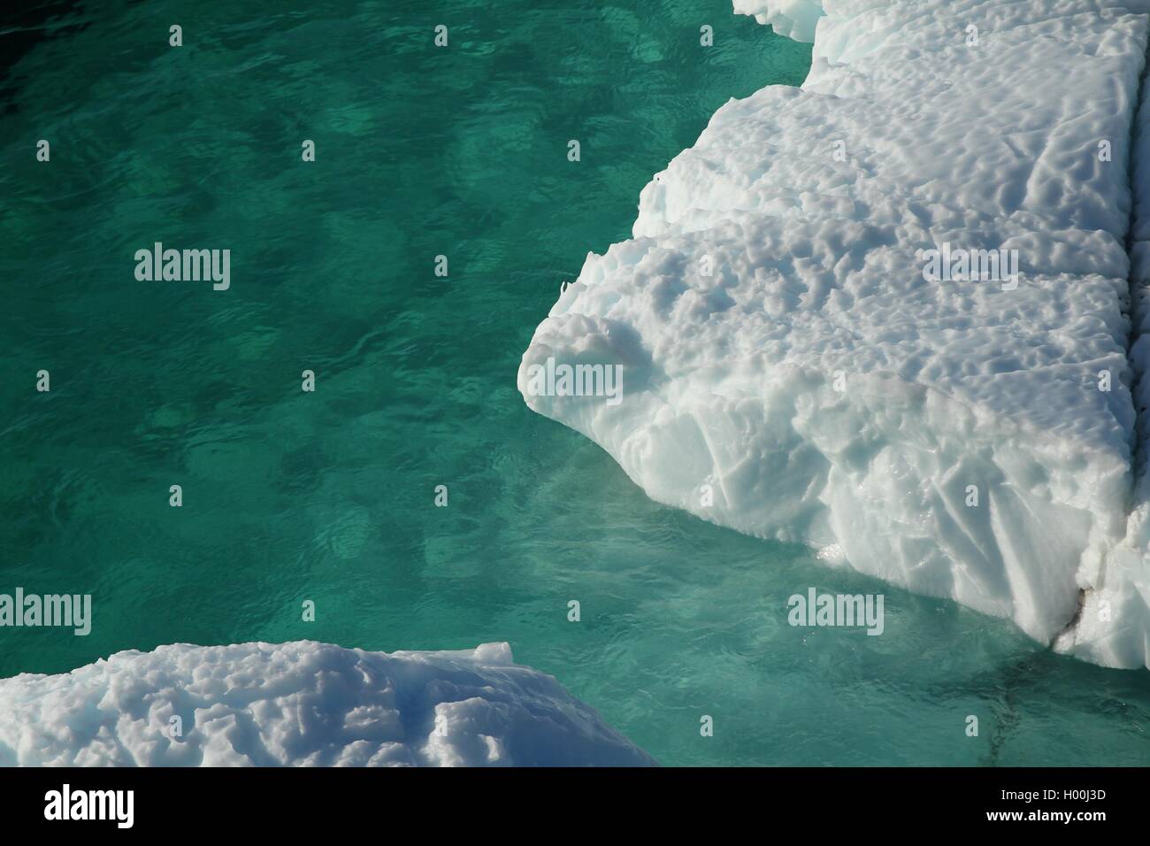 Iceberg in turquise water Stock Photo - Alamy